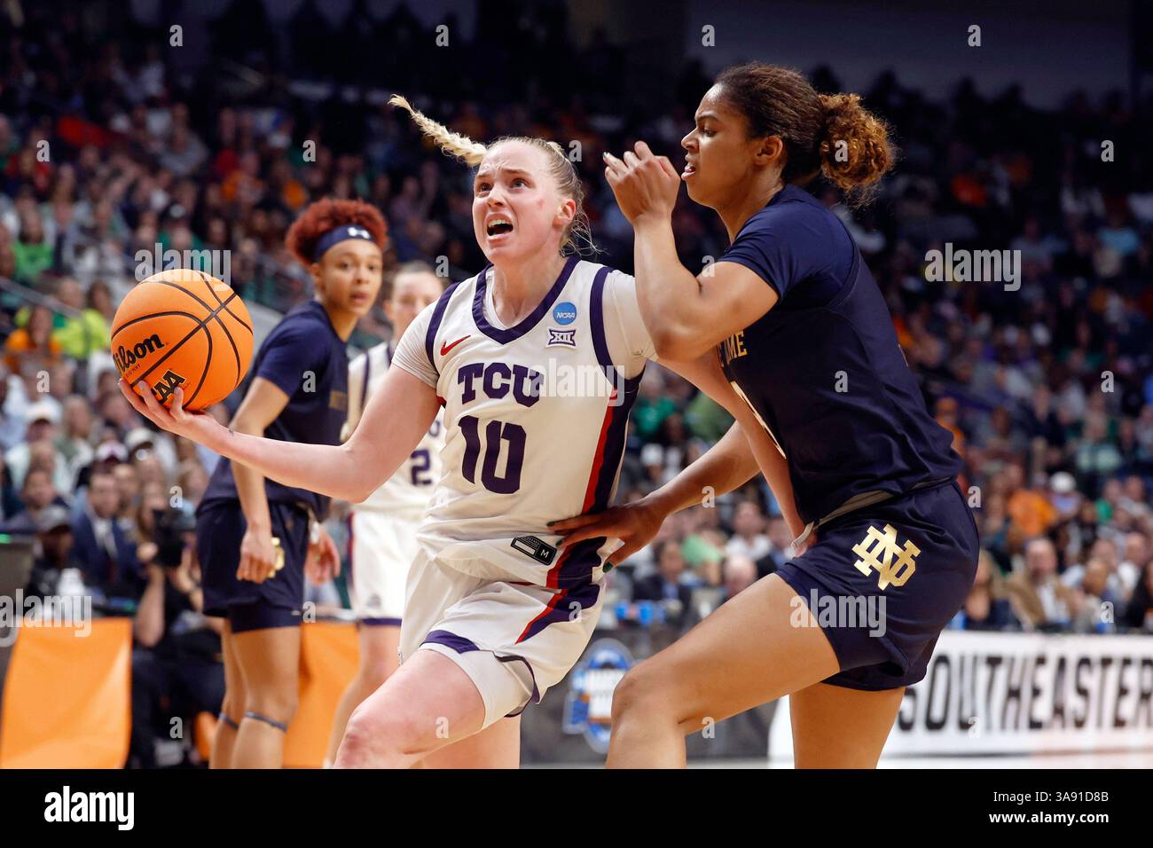 TCU guard Hailey Van Lith (10) goes to the basket around Notre Dame ...