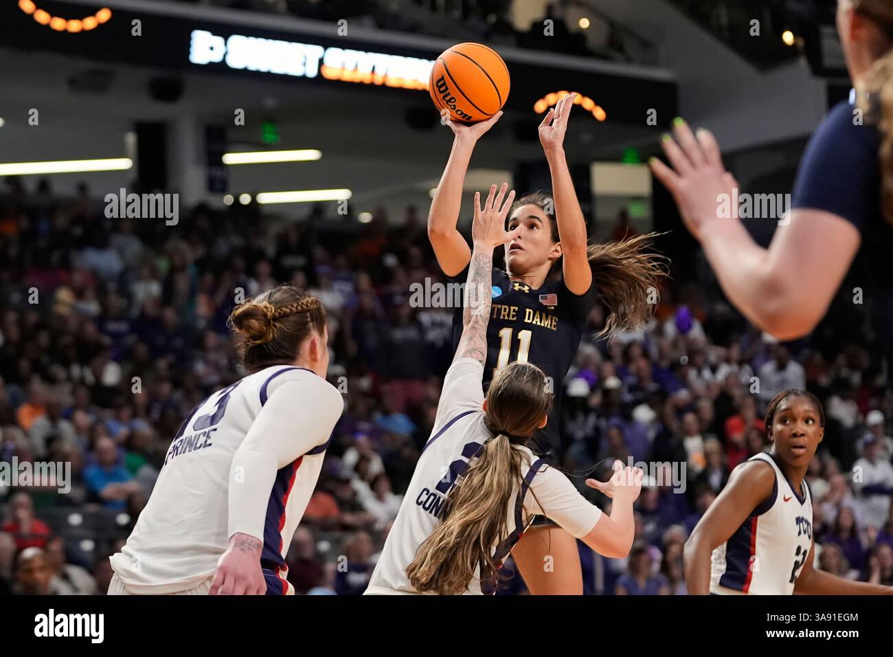Notre Dame guard Sonia Citron (11) shoots over TCU guard Madison Conner ...