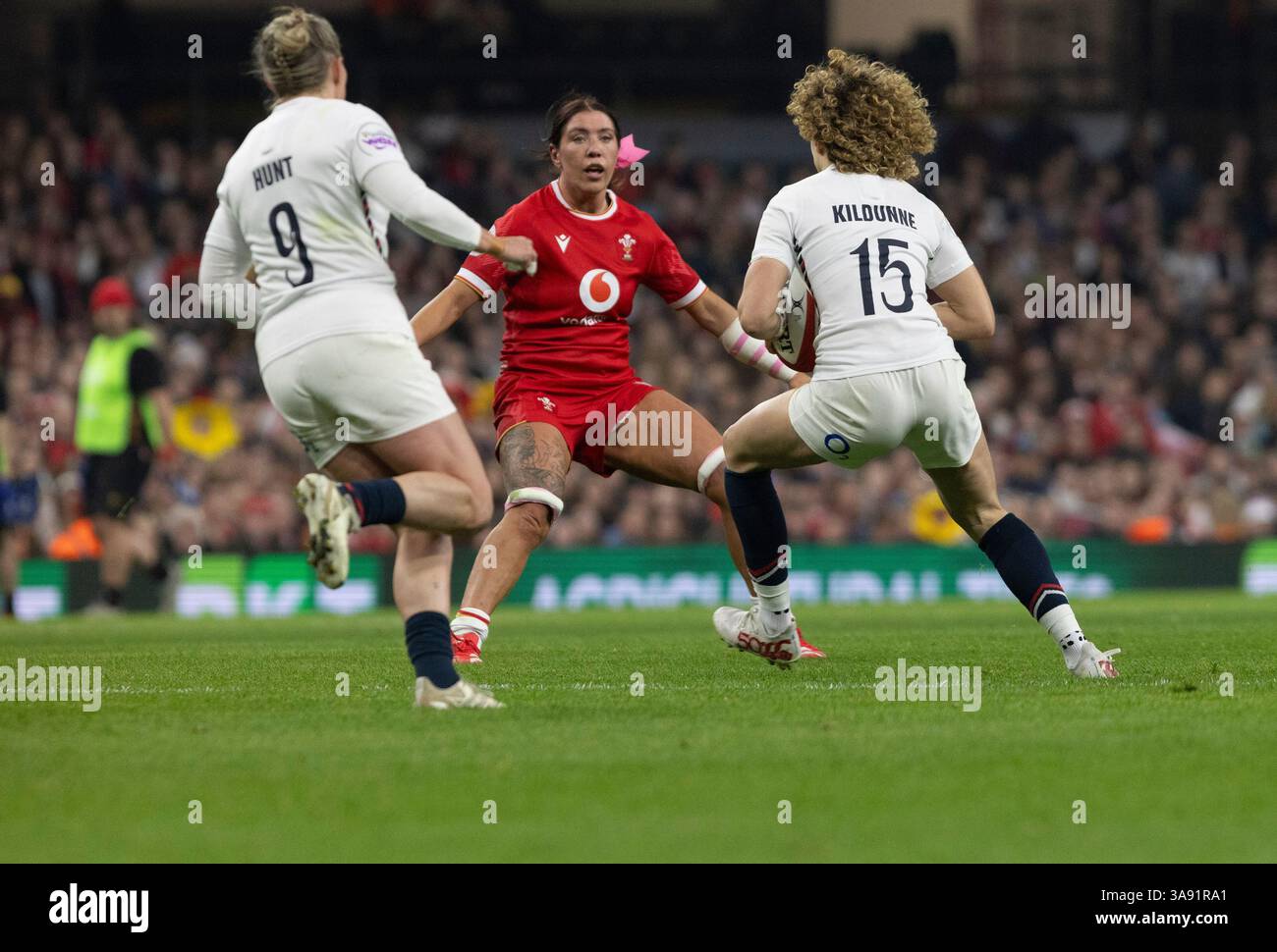 Wales’s Georgia Evans (Saracens) setting up to tackle England’s Ellie ...