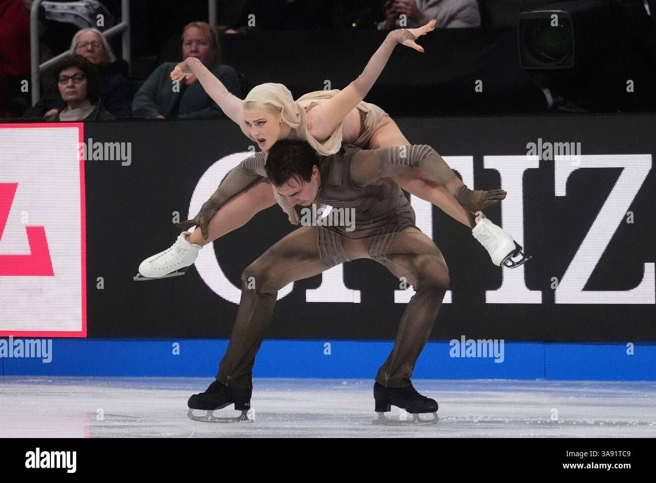 Olivia Smart and Tim Dieck, of Spain, perform during the ice dance free ...