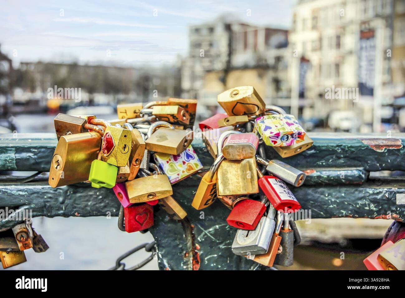 Padlocks tied on a bridge as a symbol of eternal love in an Amsterdam ...
