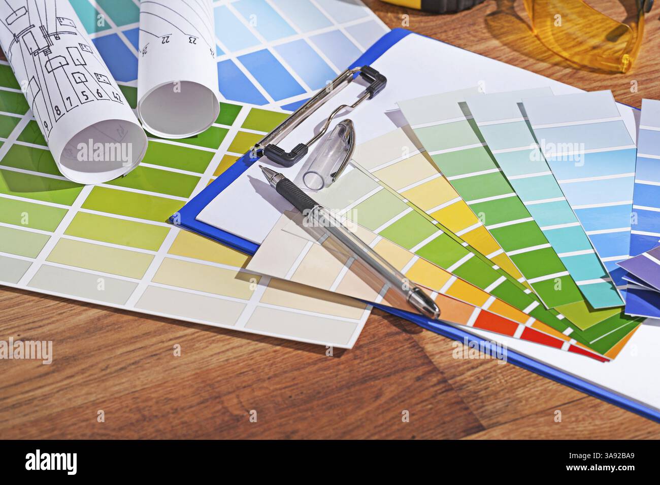 Color palettes on wooden table Stock Photo - Alamy