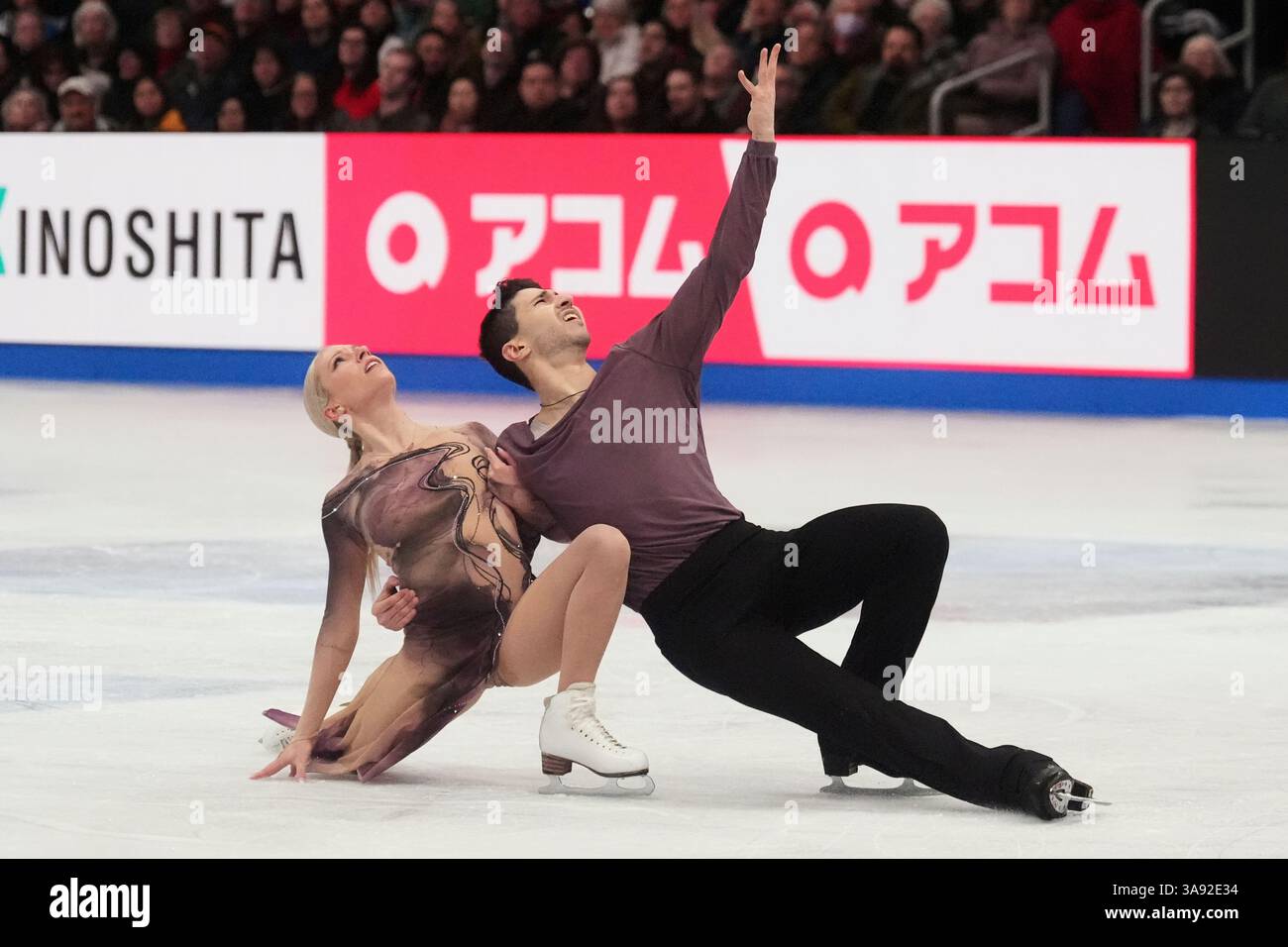 Marjorie Lajoie and Zachary Lagha, of Canada, perform during the ice ...