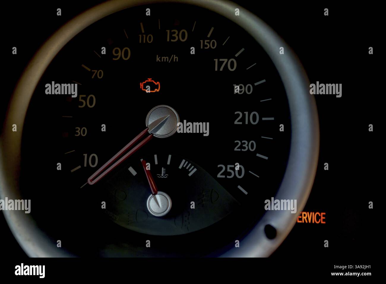 Illuminated check engine light displayed on a vehicle dashboard Stock ...