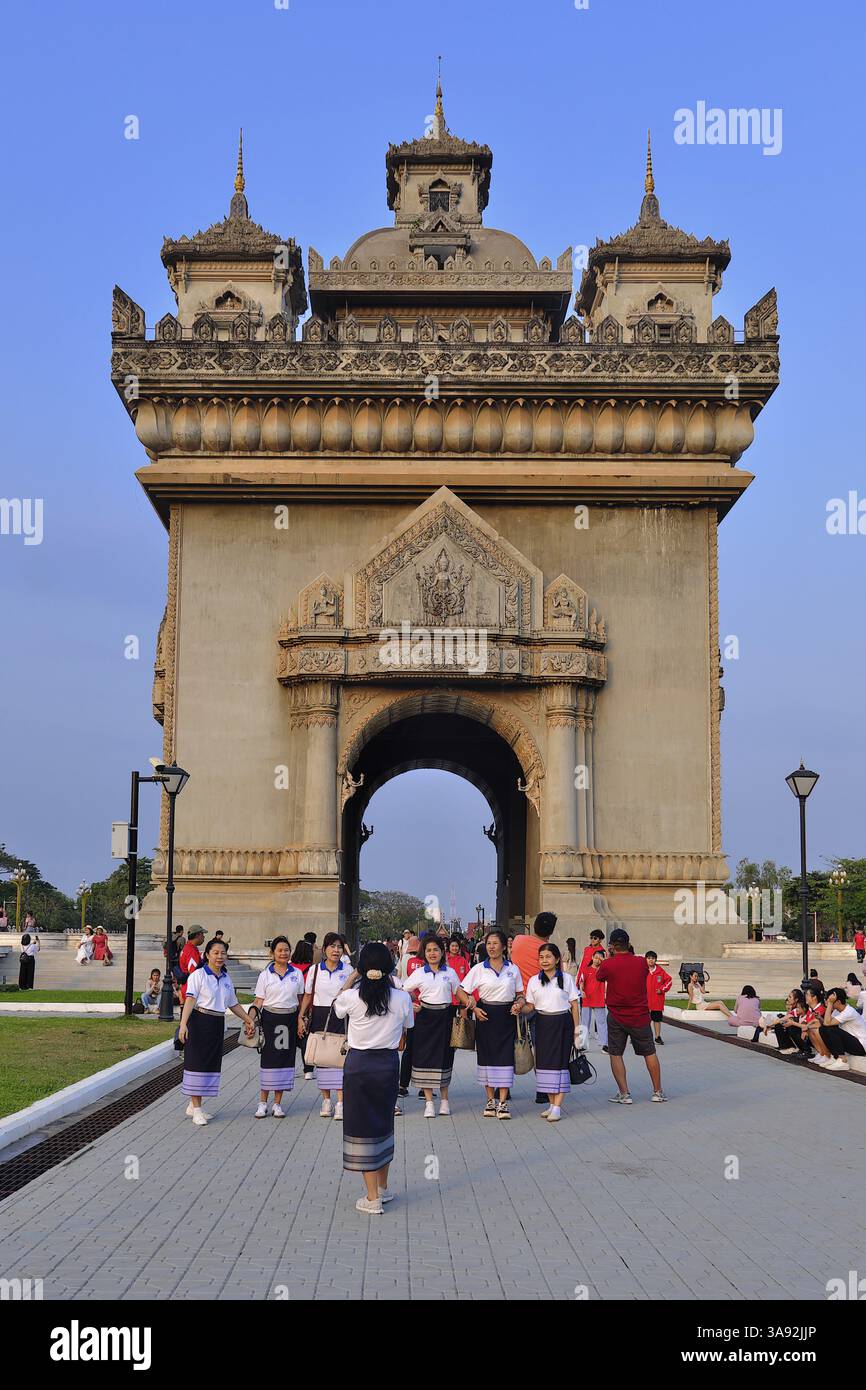 Group of girls in front of the Patuxai, triumphal arch, monument to the ...