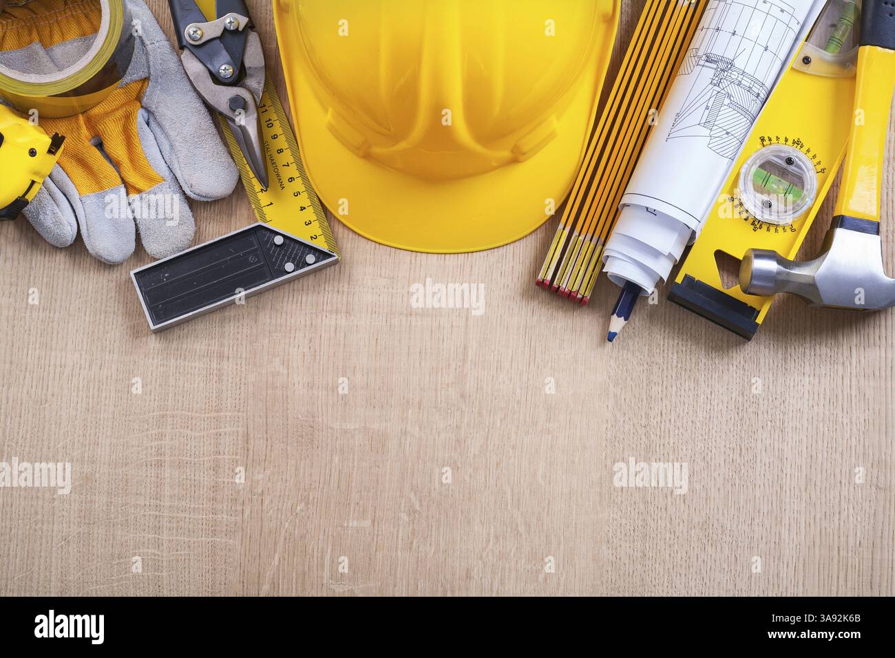 Variety of building objects on oak wooden board construction concept ...