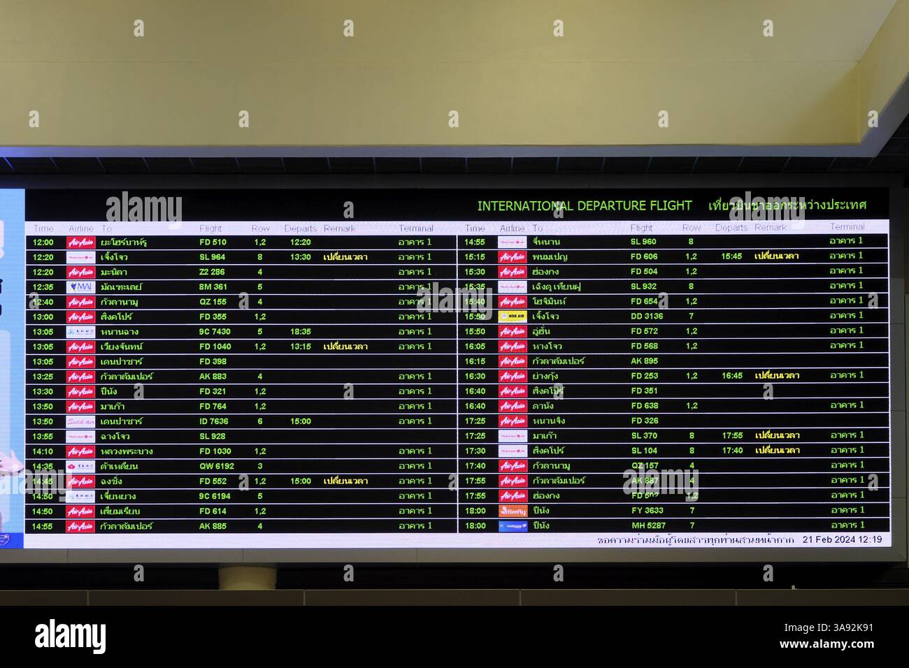 Display board for international departures in Thai at the old Bangkok ...