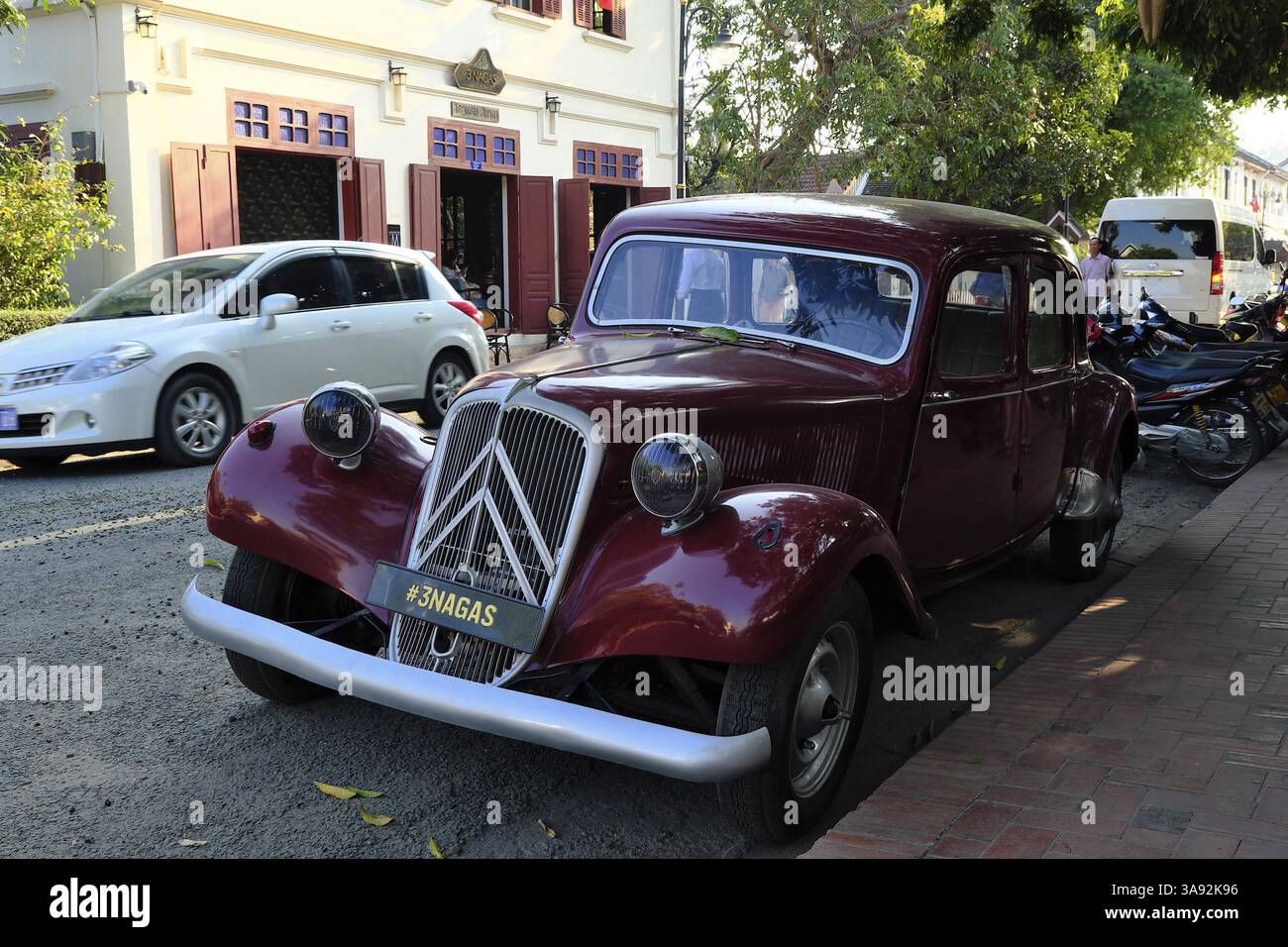 French vintage car in the streets of Luang Prabang, Luang Prabang, Laos ...