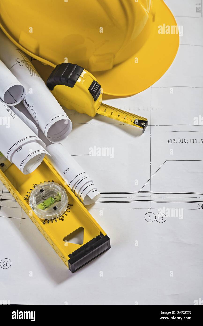 Architecture blueprints and work tool vertical Stock Photo - Alamy