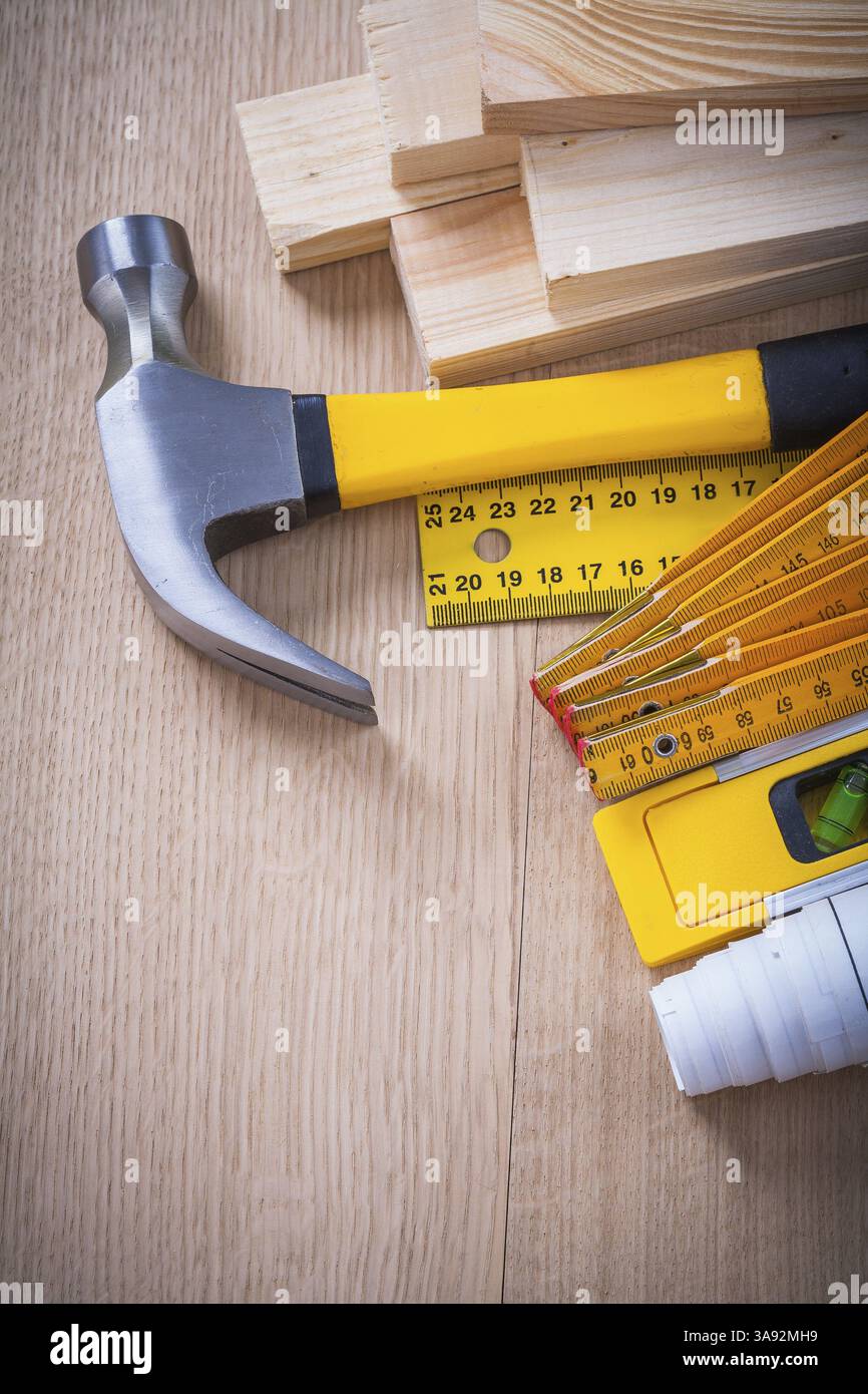 Variety of building objects for maintenance works on wooden surface ...