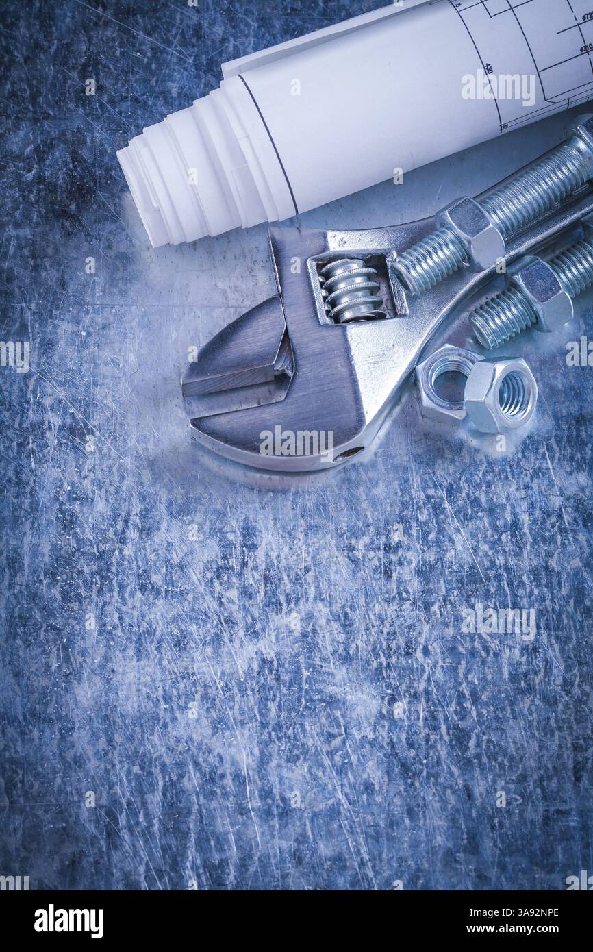 Steel adjustable spanner construction nuts bolts and blueprints on ...