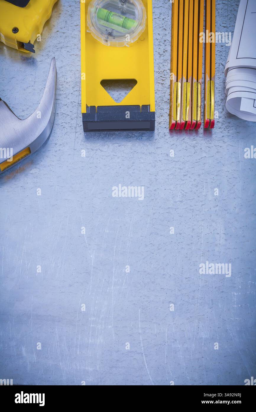 Wooden meter claw hammer construction level tape measure and roll of ...