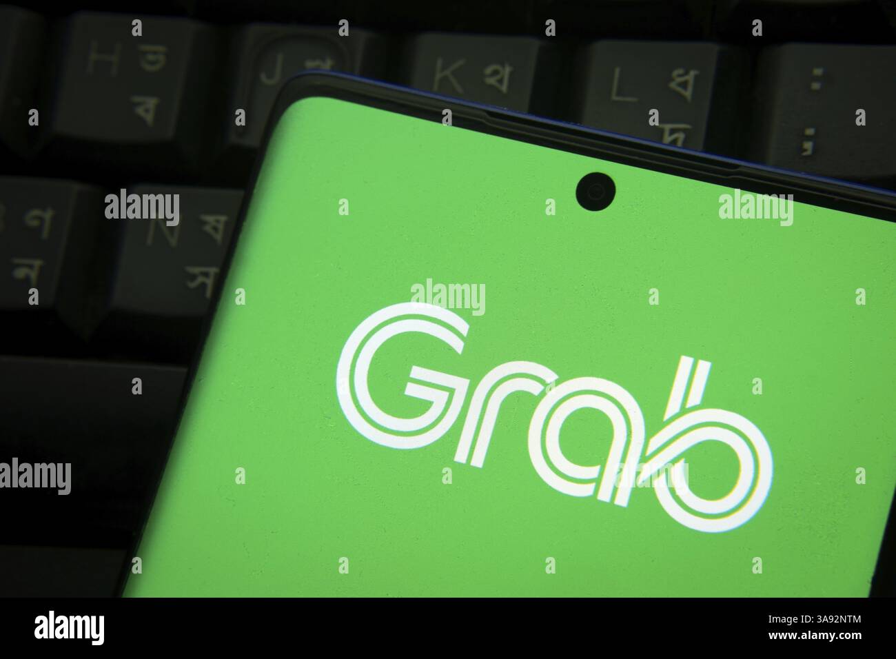 Grab Logo on smartphone Stock Photo - Alamy