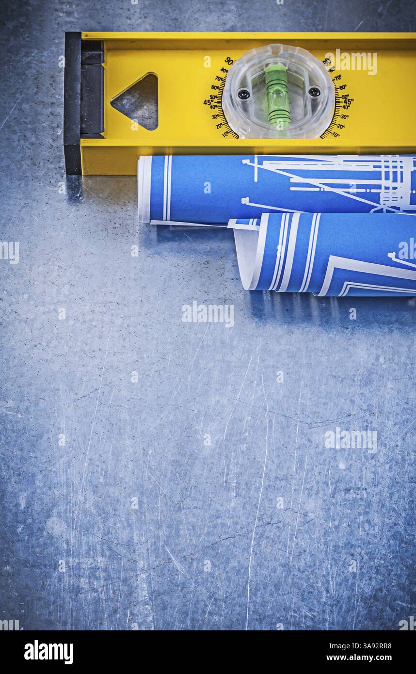 Set of blue construction drawings level on metallic background Stock ...