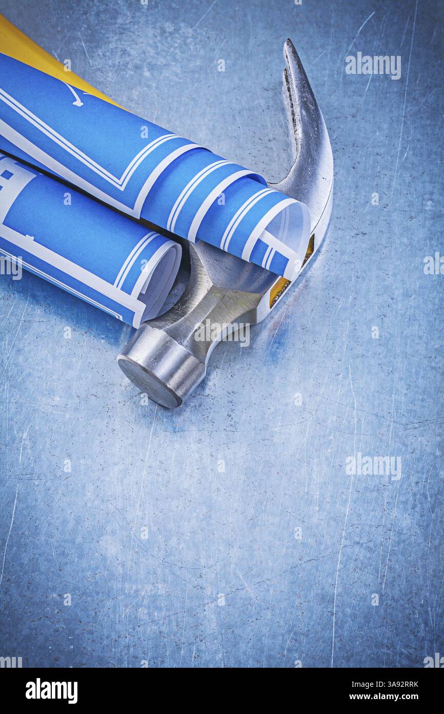 Set of blue construction plans claw hammer on metallic background Stock ...