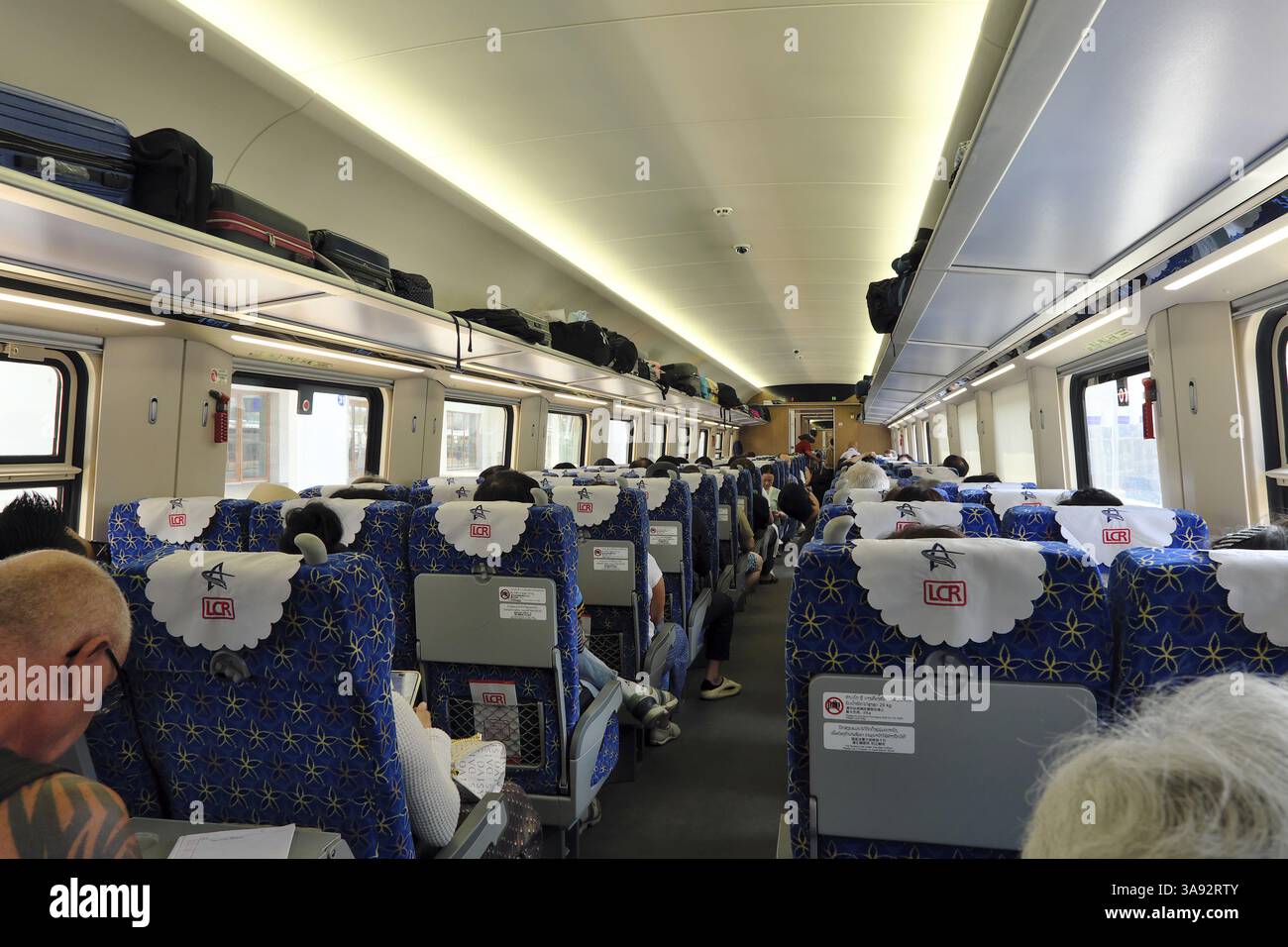 Interior view of a passenger coach of the express train of the Laos ...