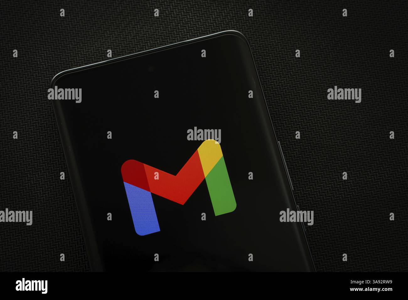 The logo of the Gmail is displayed on a smartphone screen Stock Photo ...