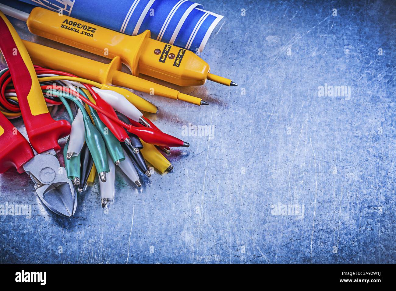 Yellow electrical tester crocodile clip cables blue construction plans ...