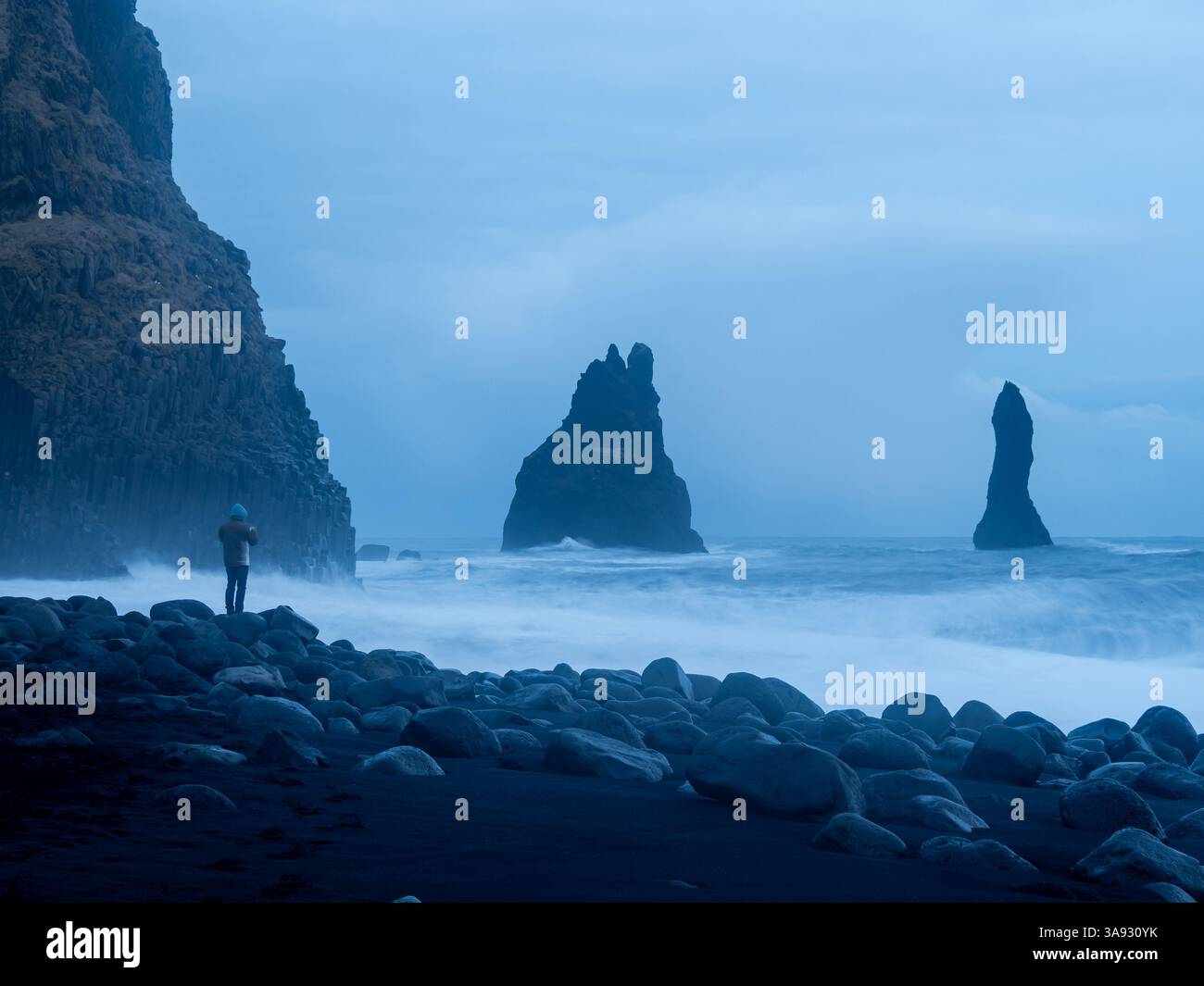 Reynisfjara Beach, Iceland: Iconic black sand beach with powerful Atlantic waves, basalt columns ...
