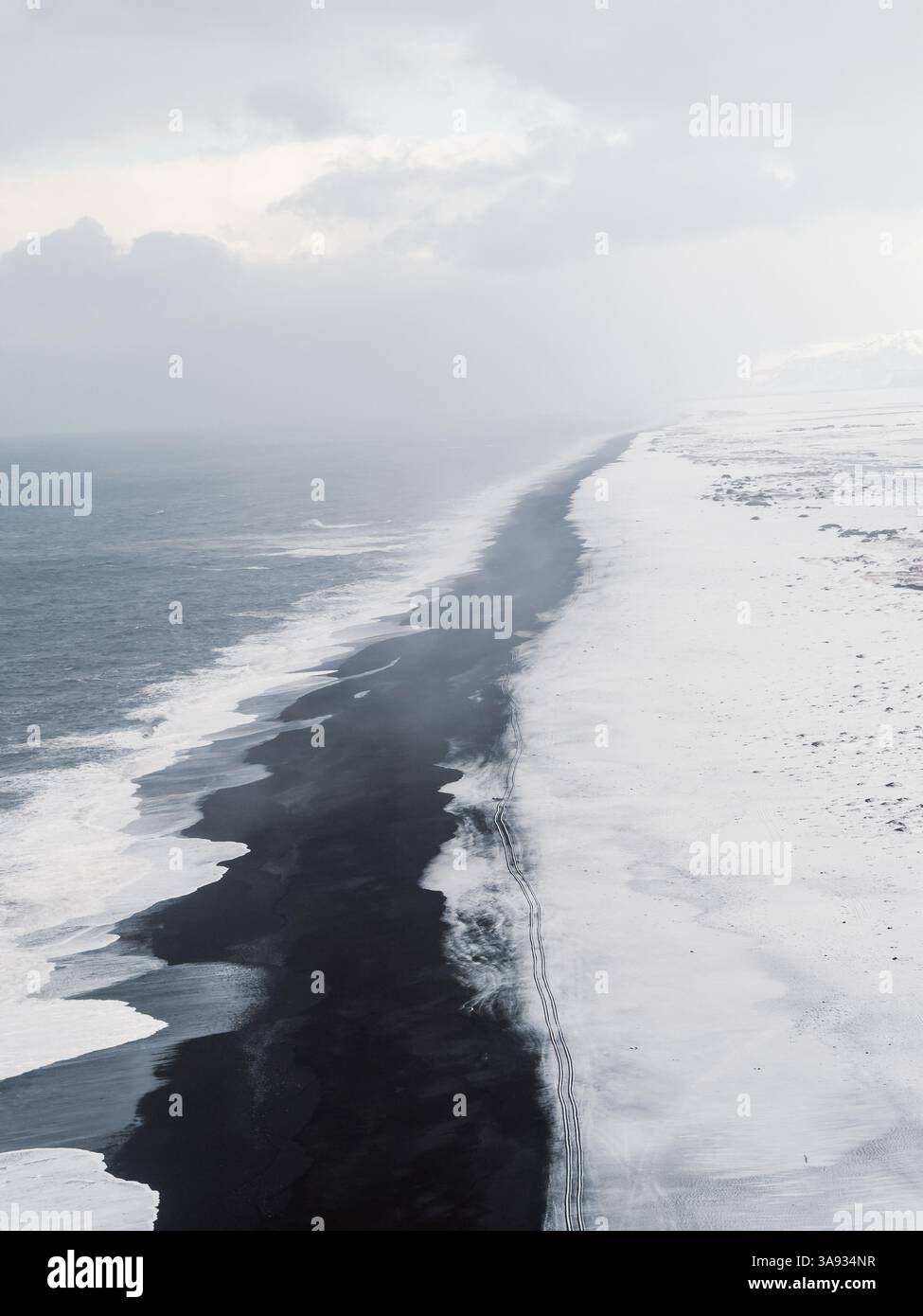Snow meets lava at Iceland’s black sand beach. A minimalist dreamscape ...