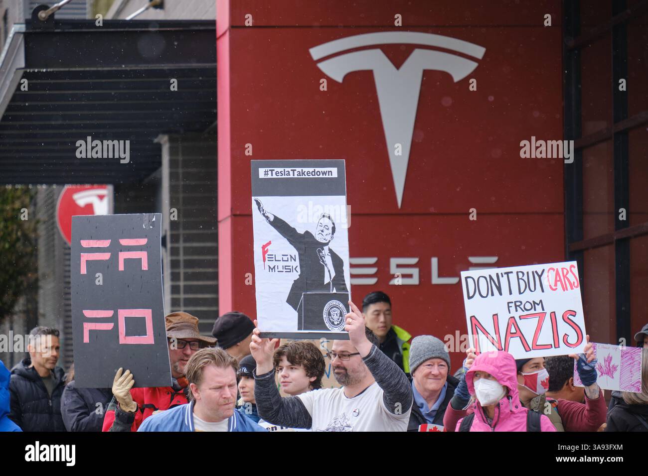 Raised protest sign hi-res stock photography and images - Alamy