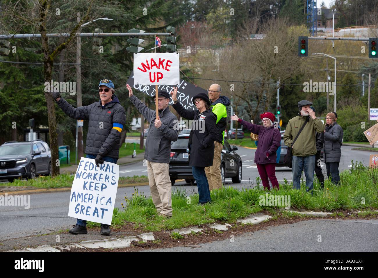 Seattle, Washington, USA. 29th March, 2025. Protesters gather along NE ...