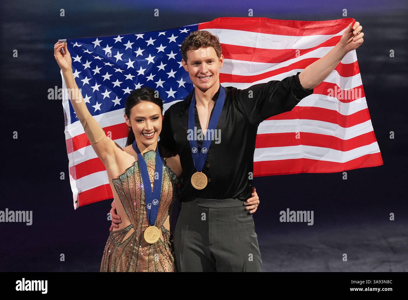 Gold medalists Madison Chock and Evan Bates, of the United States, pose ...