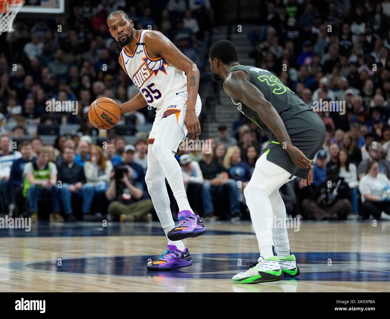 Phoenix Suns forward Kevin Durant (35), handles the ball as Minnesota ...