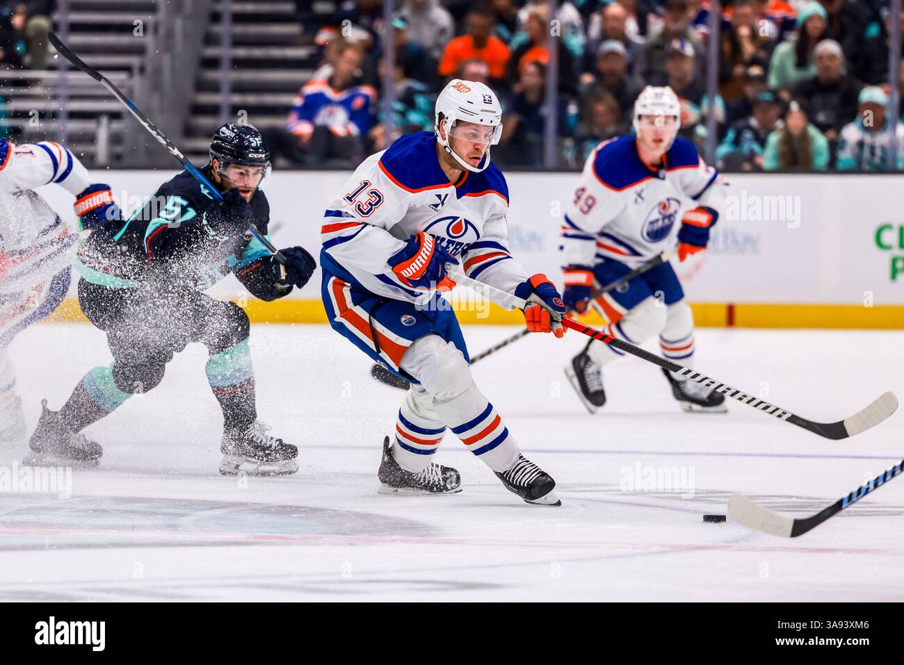 Edmonton Oilers center Mattias Janmark (13) skates with the puck during ...