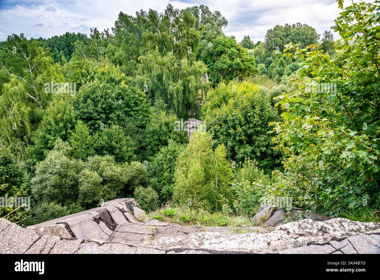 Destroyed old railway bridge in Kruklanki, Poland, August 2021 Stock ...