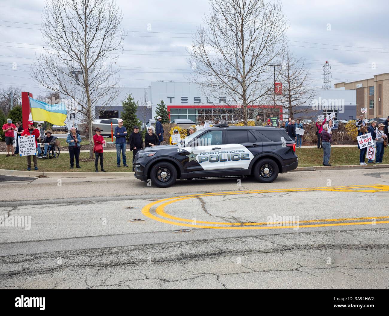 Northbrook, IL. USA – March 29, 2025: People gather peacefully at the ...