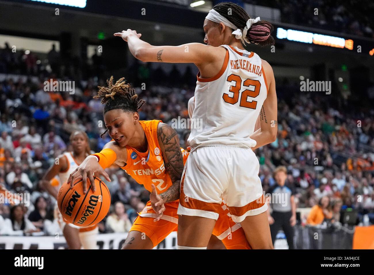 Tennessee guard Ruby Whitehorn (2) grabs a rebound against Texas guard ...