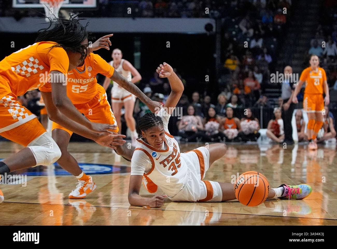 Texas forward Madison Booker (35) and Tennessee guard Talaysia Cooper ...