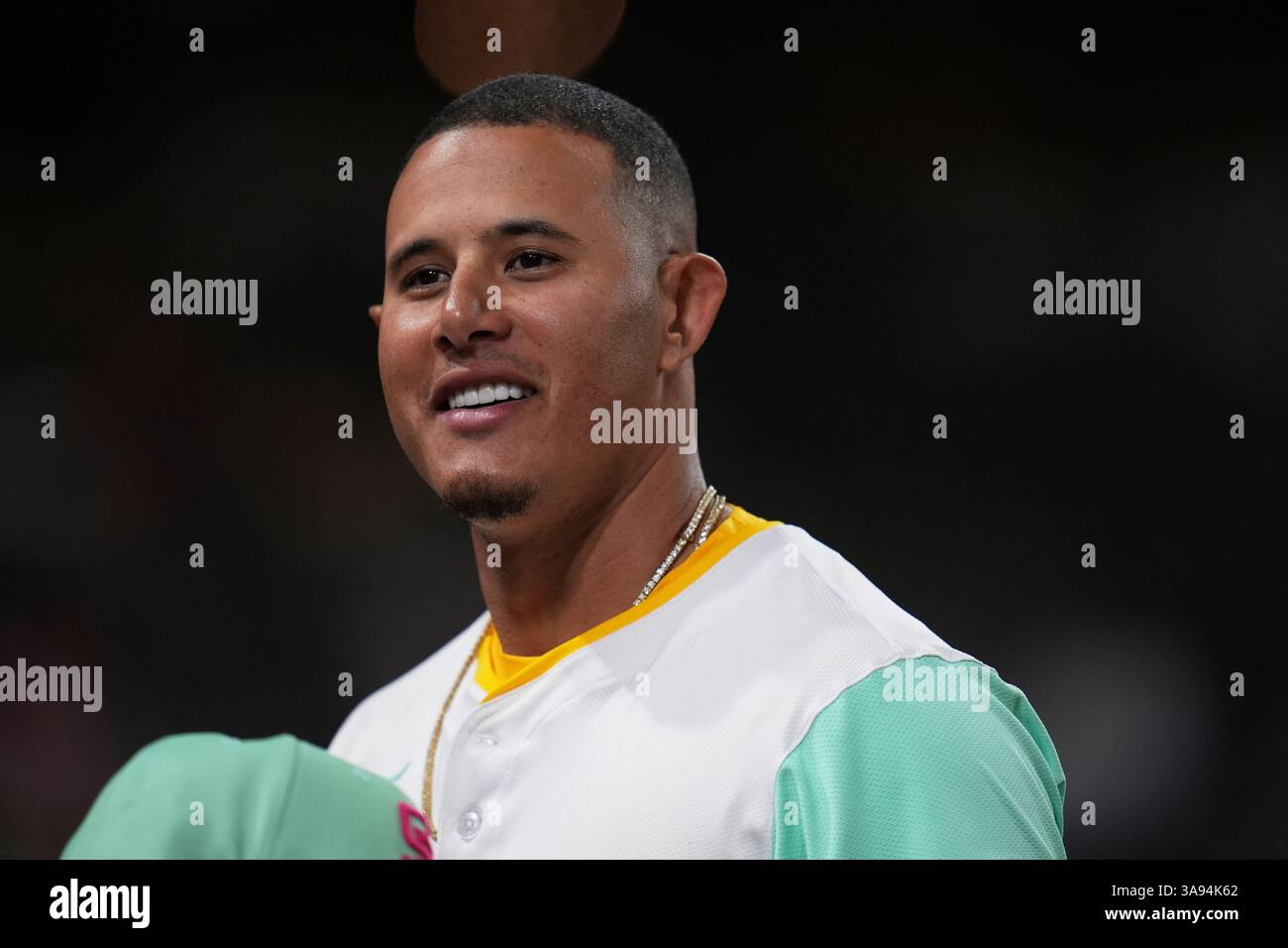 San Diego Padres third baseman Manny Machado jokes with teammates as he ...