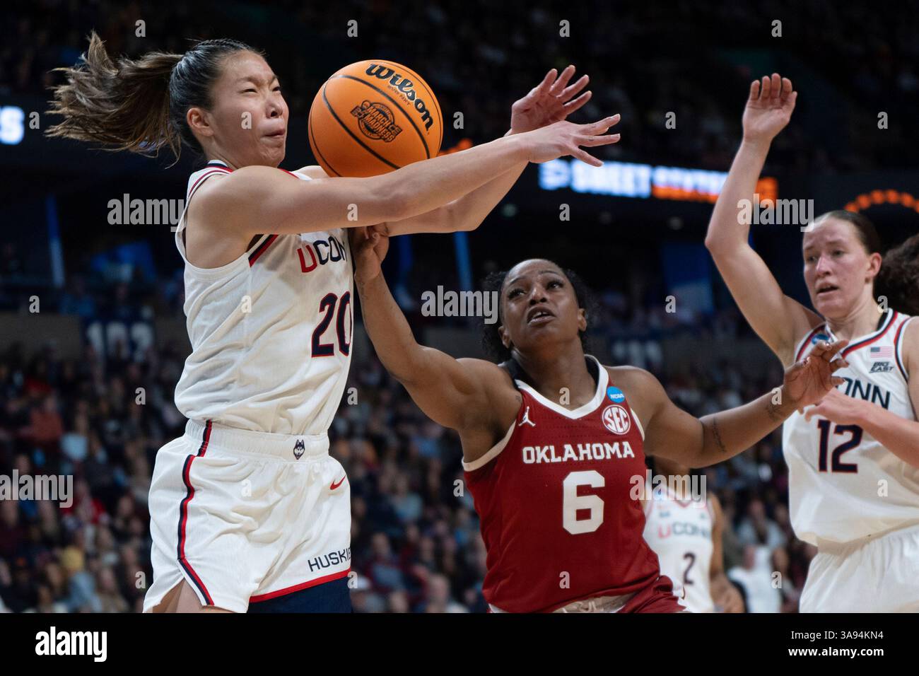 UConn guard Kaitlyn Chen (20) and Oklahoma forward Sahara Williams (6 ...