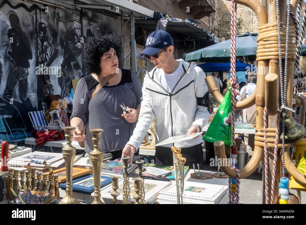 Haifa, Israel, 28 March 2025, Two people shopping at a street market ...