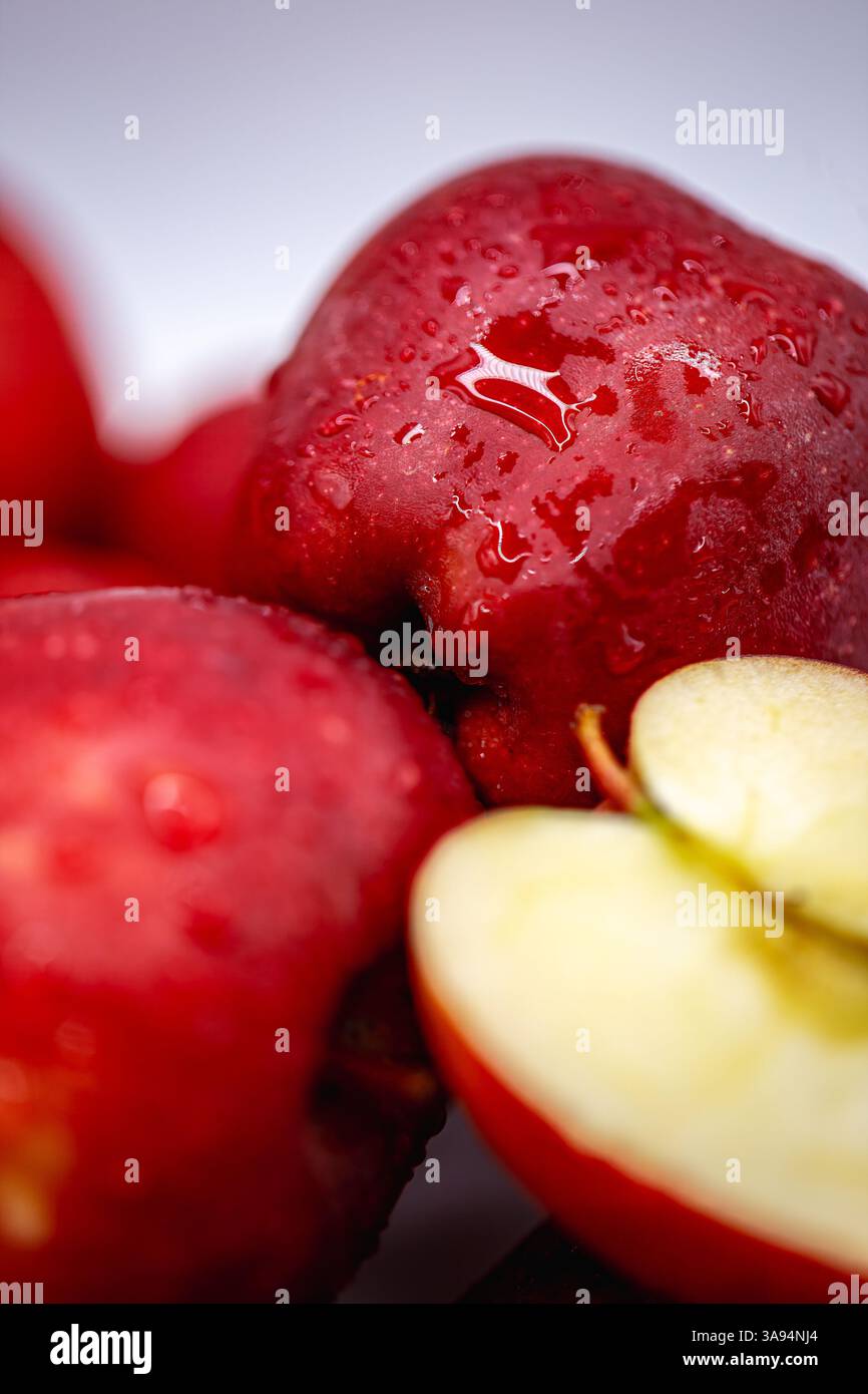 Red Delicious Apples in a group and cut ready to eat Stock Photo - Alamy