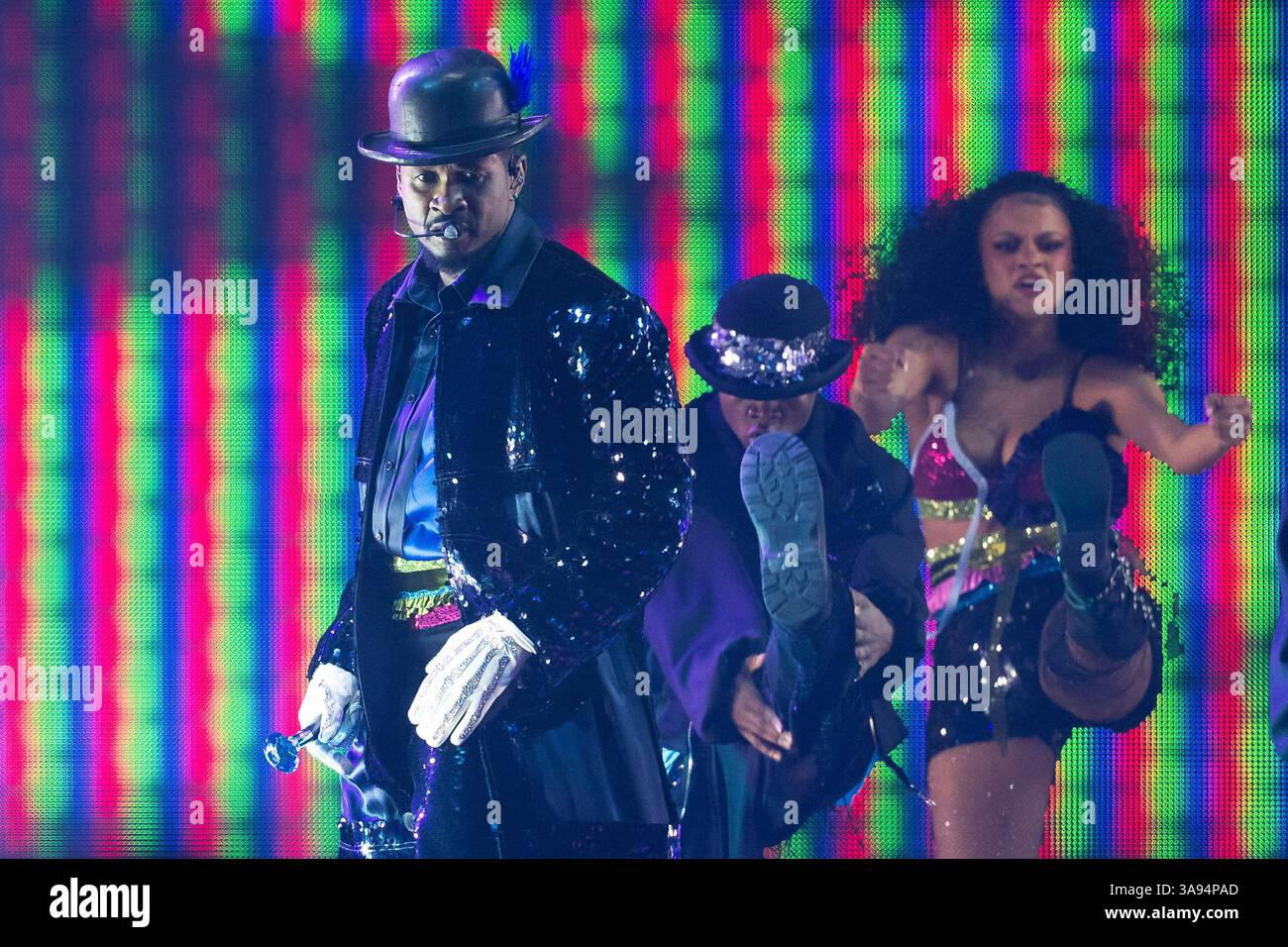 Usher performs on stage at the O2 Arena in London, Saturday, March 29 ...