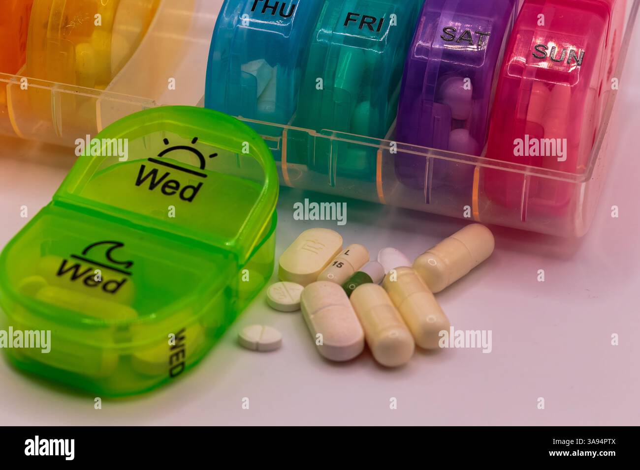 Prescription Pill and medicine organiser Stock Photo - Alamy