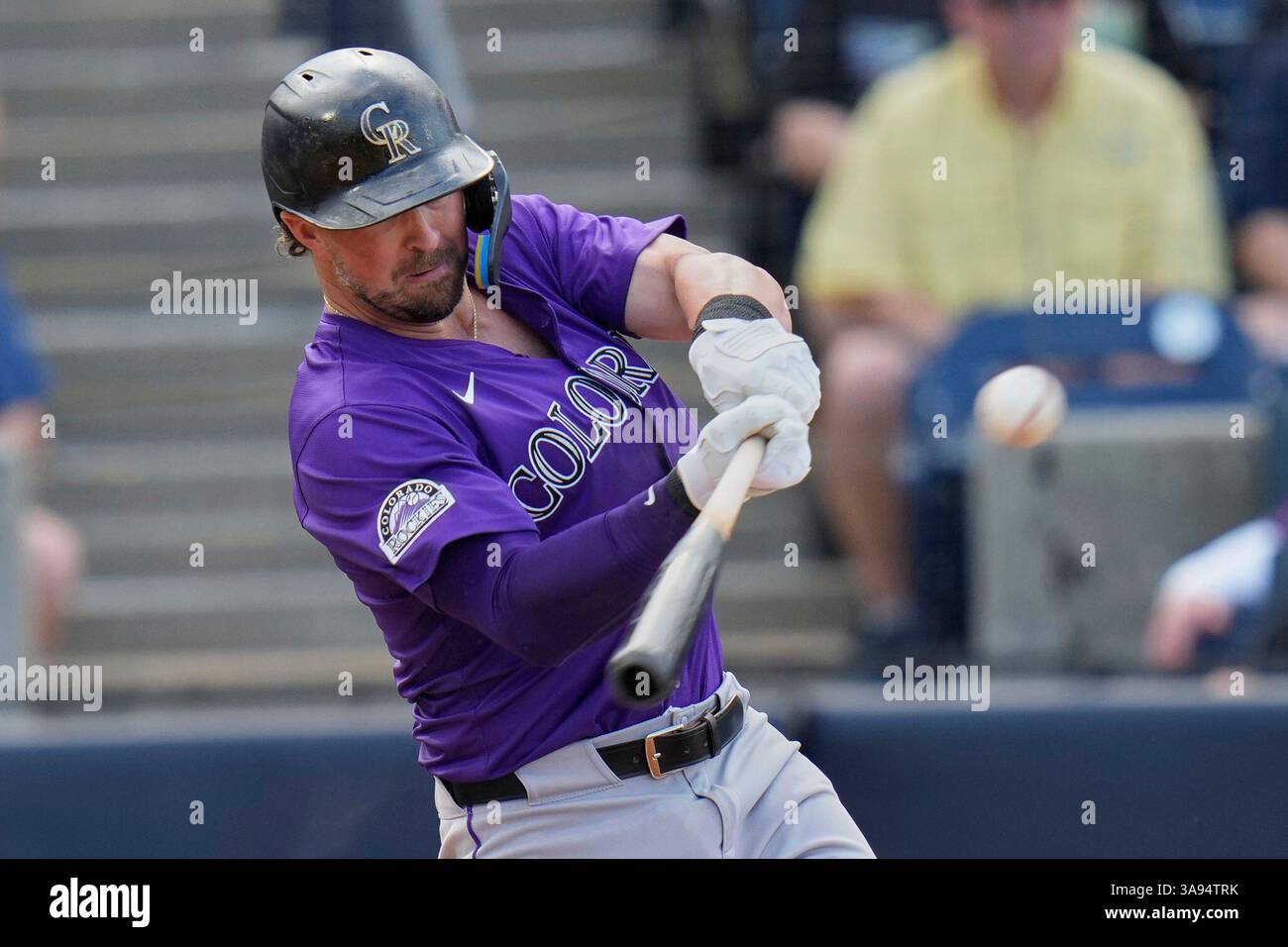 Colorado Rockies' Kyle Farmer lines an RBI single off Tampa Bay Rays ...