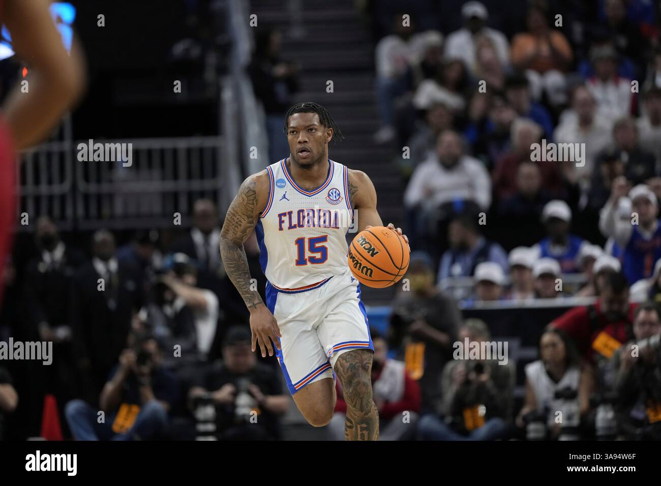 Florida guard Alijah Martin (15) moves the ball upcourt against Texas ...