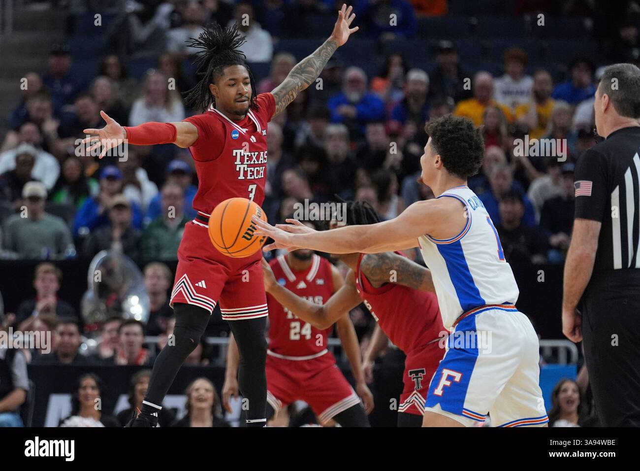 Texas Tech guard Elijah Hawkins (3) defends against Florida guard ...