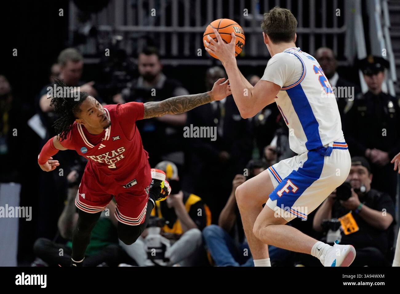 Texas Tech guard Elijah Hawkins (3) defends against Florida guard ...
