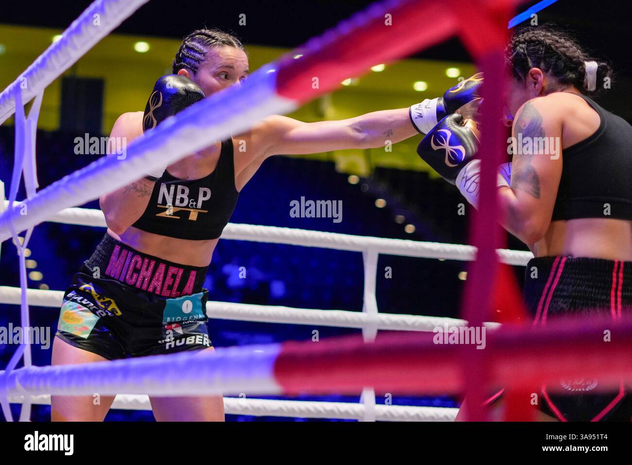 SCHWECHAT, AUSTRIA - MARCH 29: Michaela Kotaskova of Austria throws a punch against Gisela Noemi ...