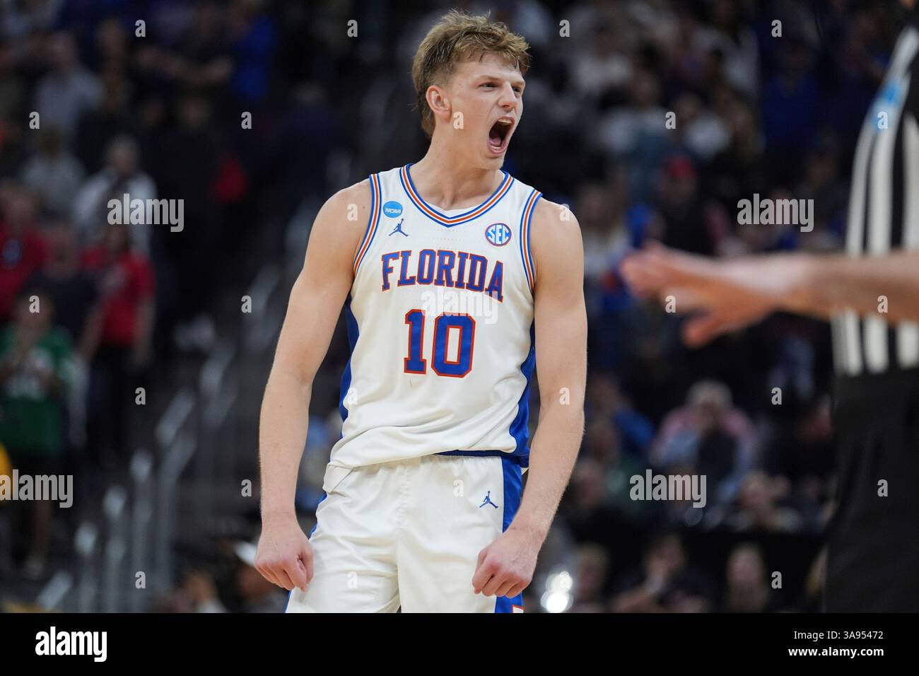Florida forward Thomas Haugh (10) celebrates during the second half in ...