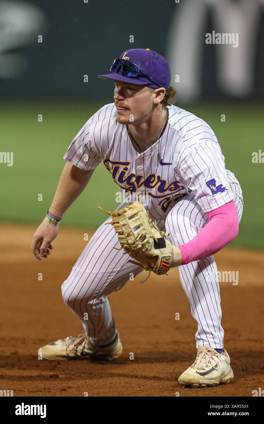 March 28, 2025: LSU first baseman Jared Jones (22) fields a ball during ...