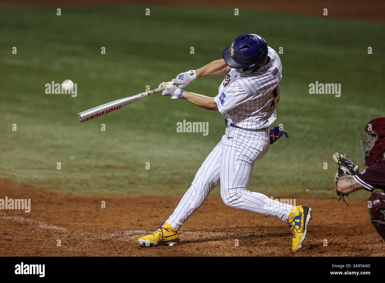 Baton Rouge, LA, USA. 28th Mar, 2025. LSU's Josh Pearson (11) tries for ...