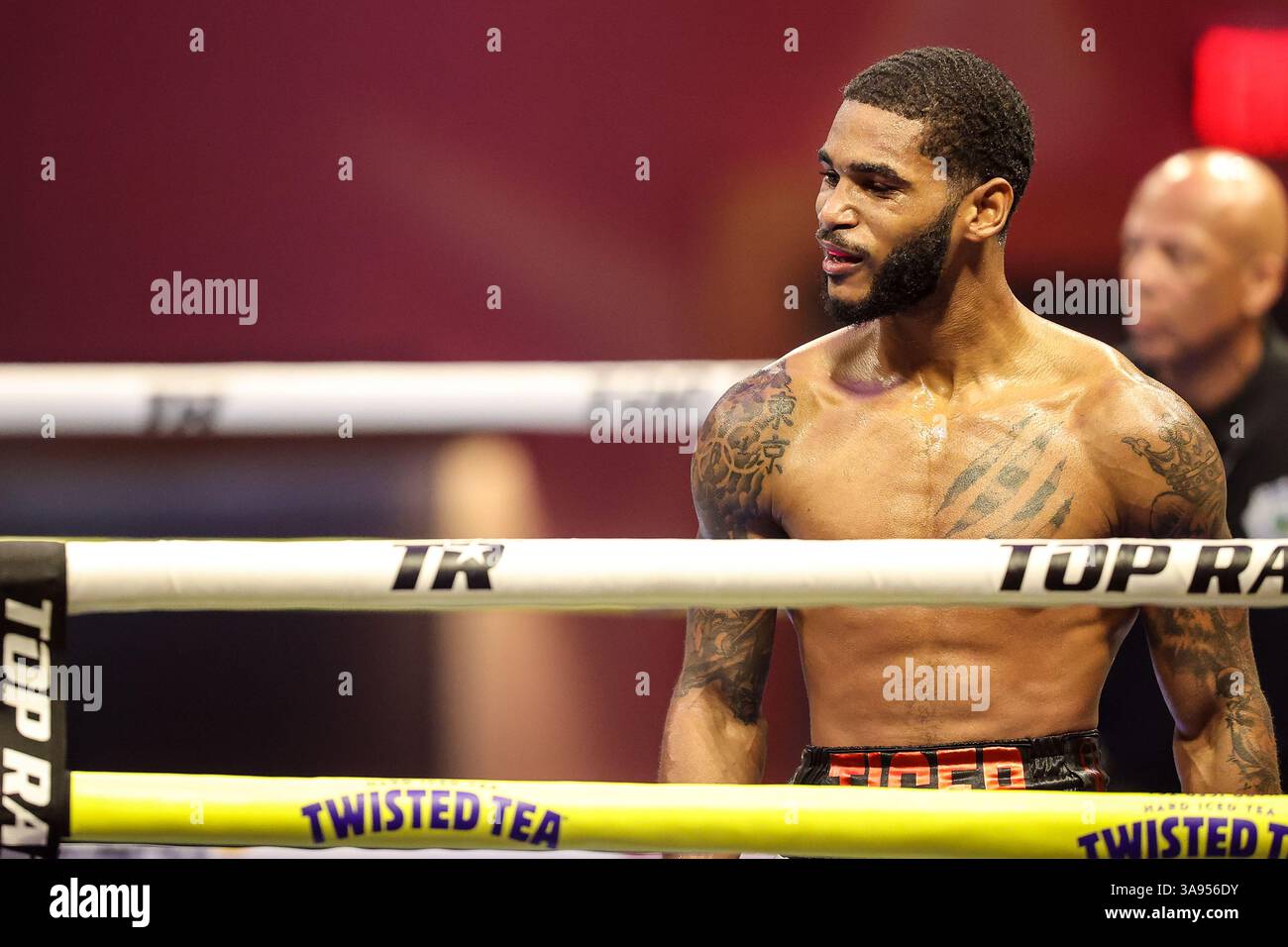 March 29, 2025: Welterweight Tiger Johnson stands walks around the ring ...