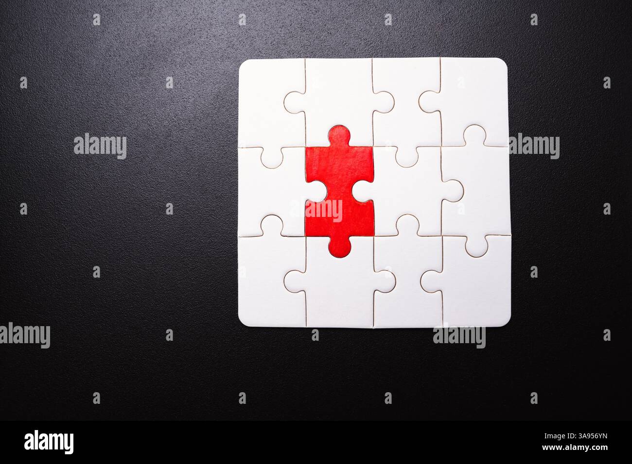 A puzzle piece with a red piece missing. The puzzle is incomplete ...