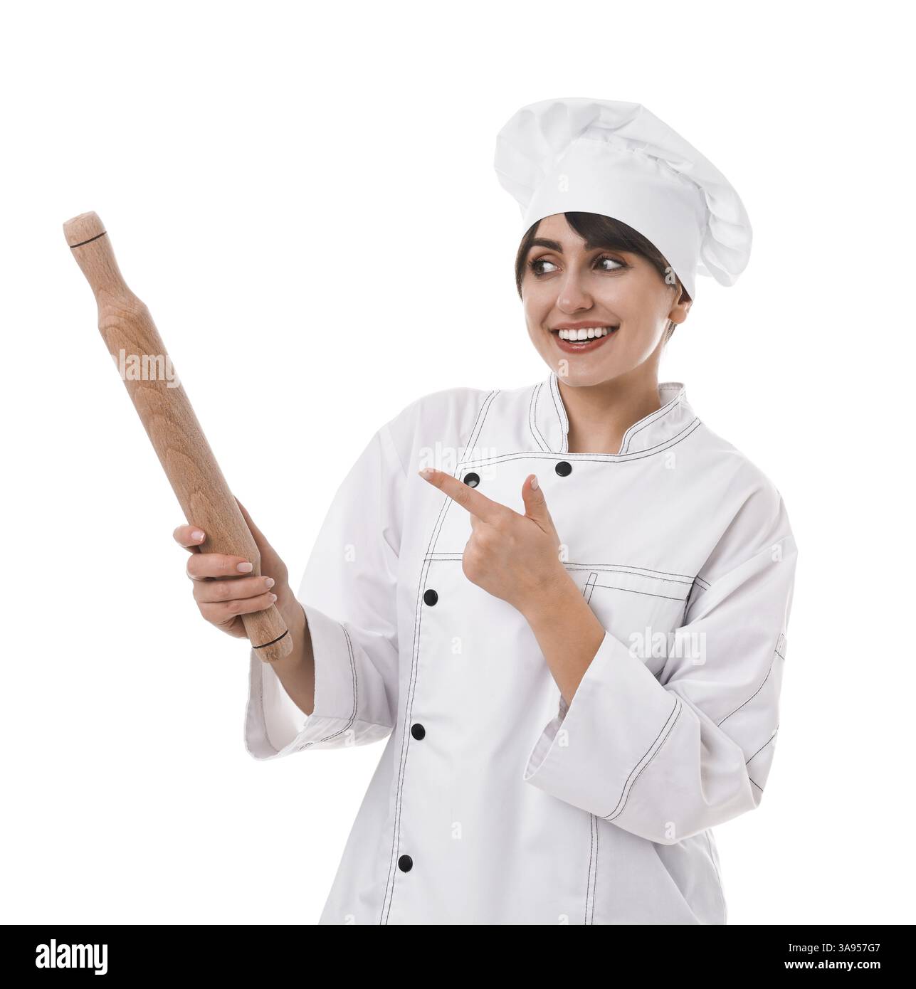 Professional chef pointing at rolling pin on white background Stock ...